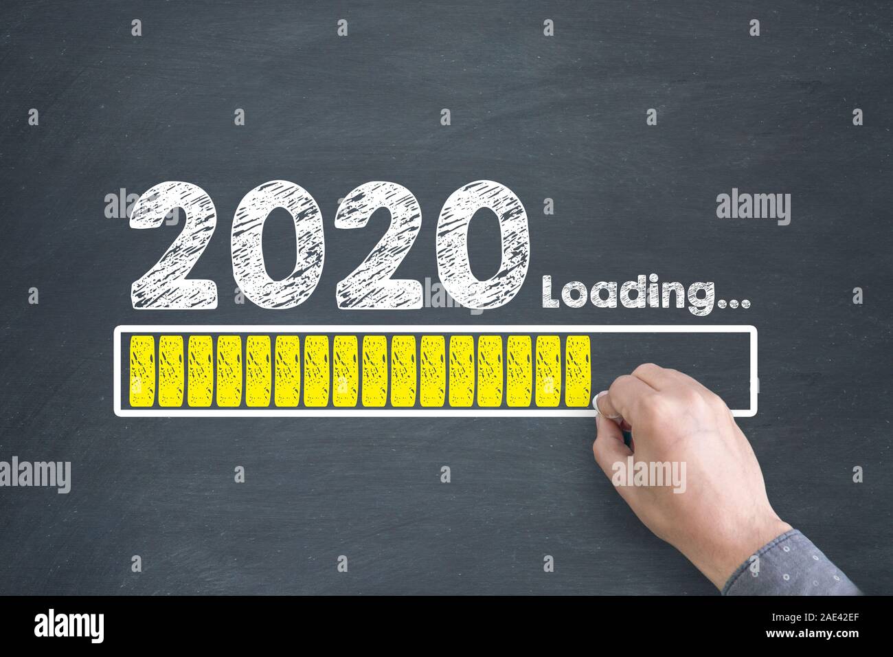 happy new year 2020. Chalkboard with 2020 loading text and loading ...
