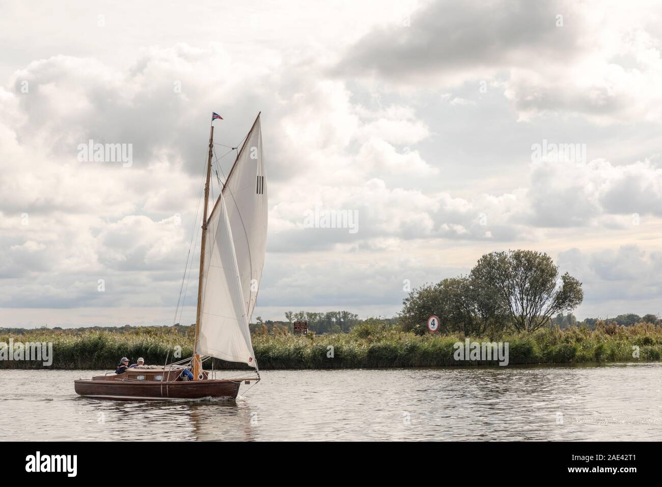 Yacht sloop on the River Bure, Norfolk Broads, England, UK Stock Photo ...