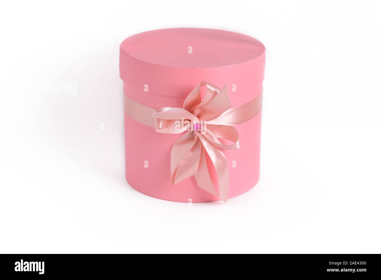 pink gift boxes in round shape isolated Stock Photo - Alamy