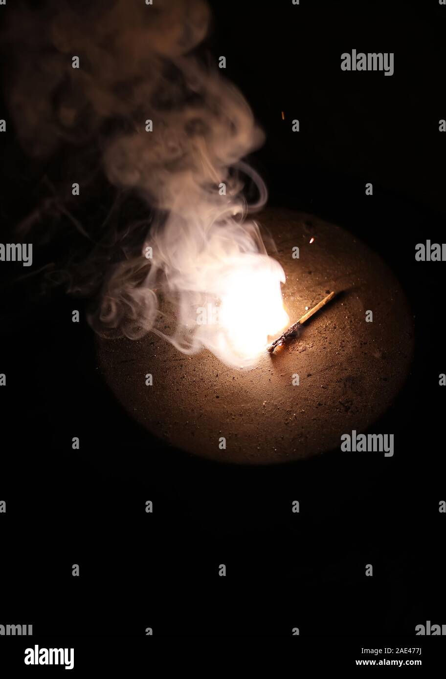 Fire burning on matchstick. Isolated on black backgrounds Stock Photo ...
