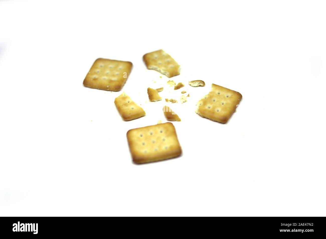 Crushed biscuits isolated on a white backgrounds Stock Photo - Alamy
