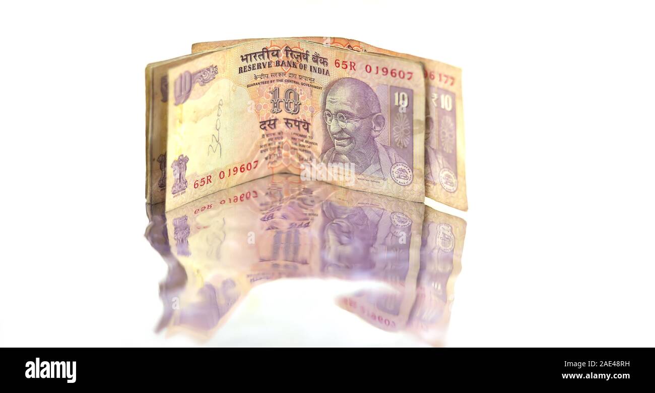 Ten rupees note damaged old note (Indian Currency) isolated on a white ...