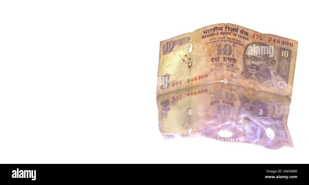 Ten rupees note damaged old note (Indian Currency) front side isolated ...