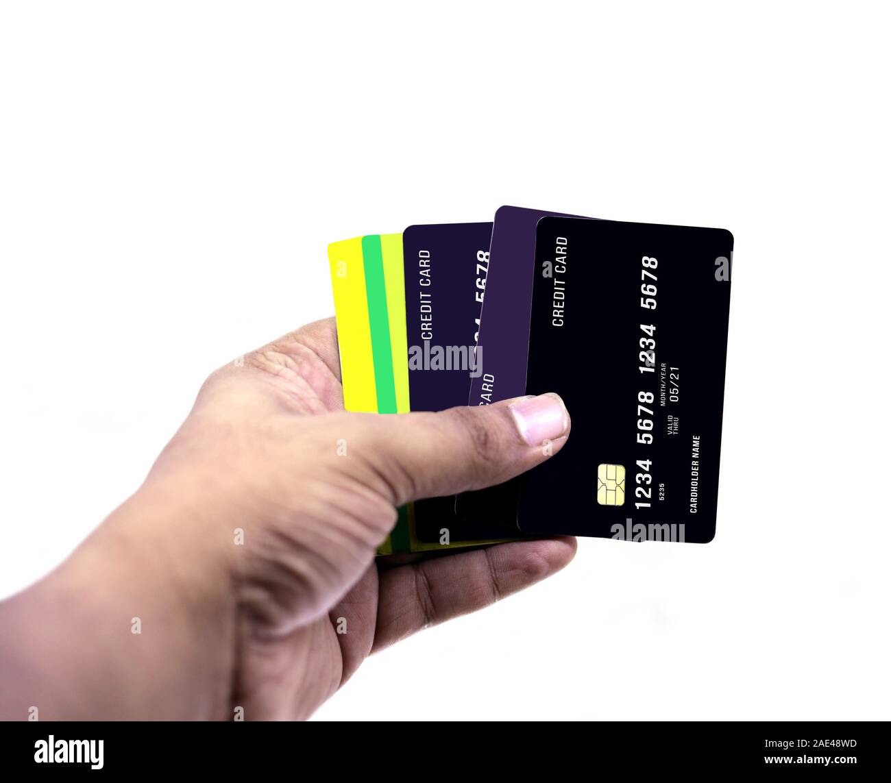 Hand holding credit cards or debit cards isolated on white backgrounds ...