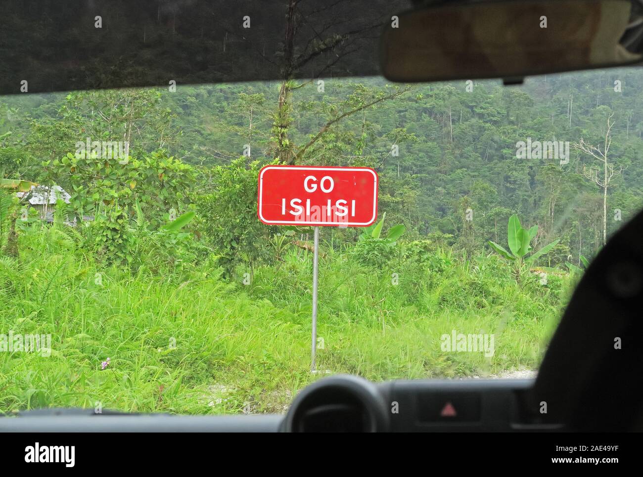 road sign in Pidgin English, ISI ISI (slow down) Tabubil, Papua New ...