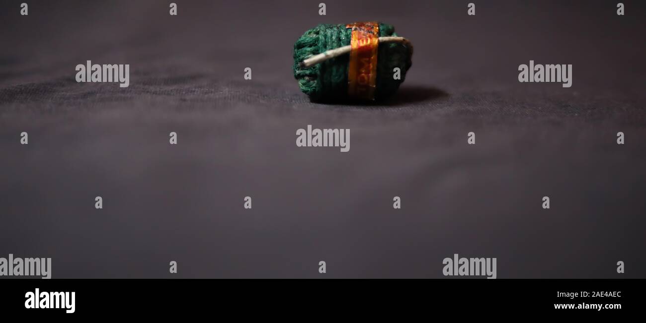 Diwali fire bomb cracker on black backgrounds Stock Photo - Alamy