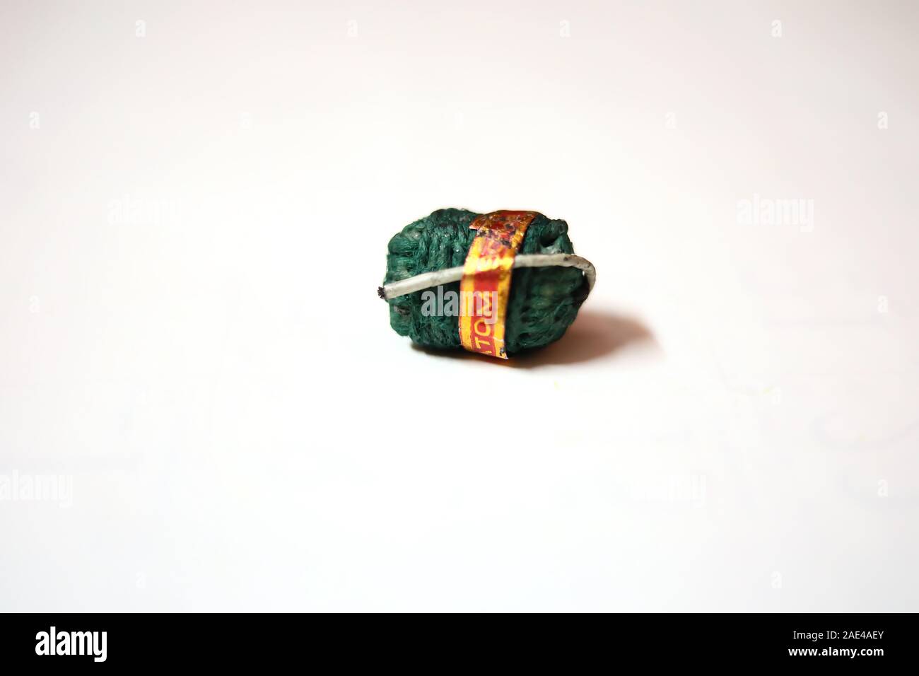 Diwali fire bomb cracker on white backgrounds Stock Photo - Alamy