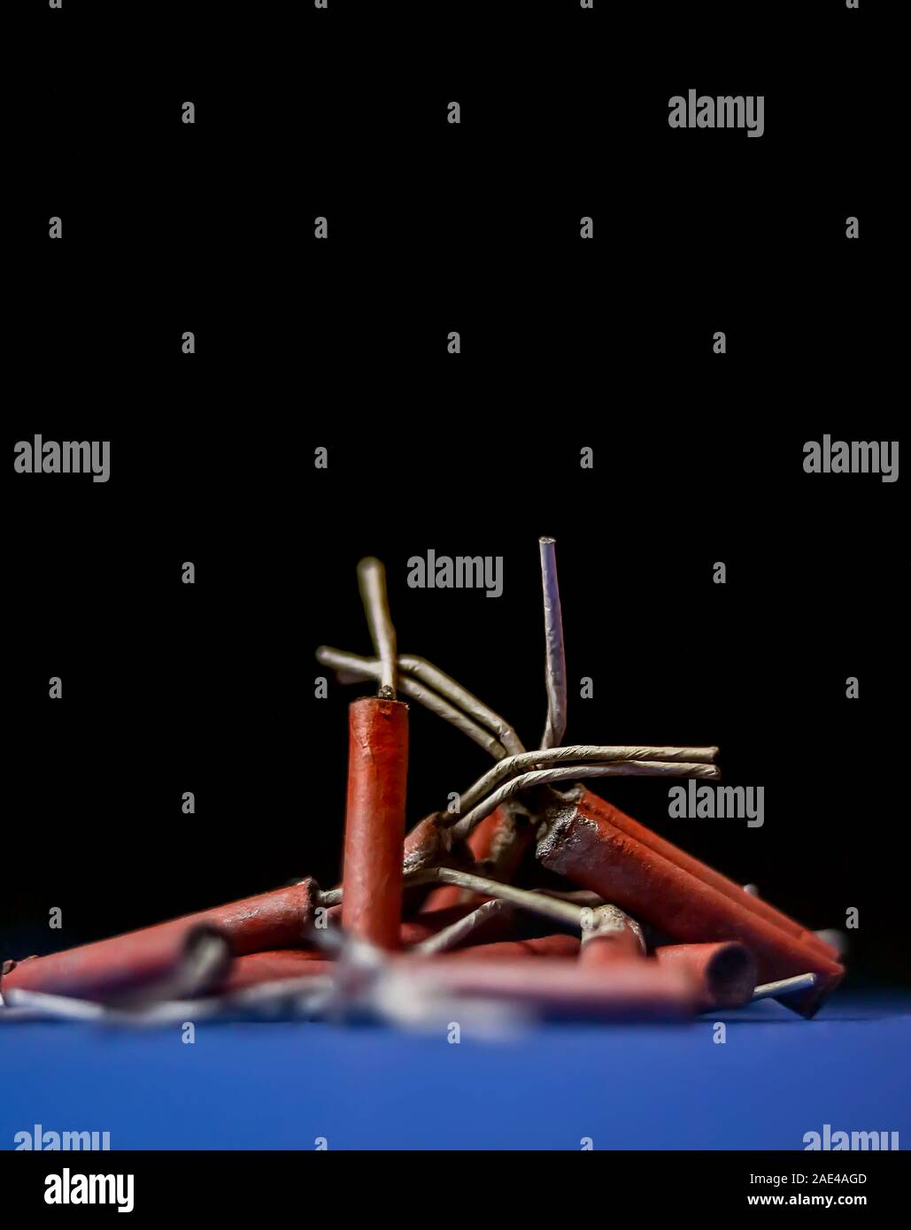 Stack of firecrackers for Diwali festival on blue and black backgrounds ...