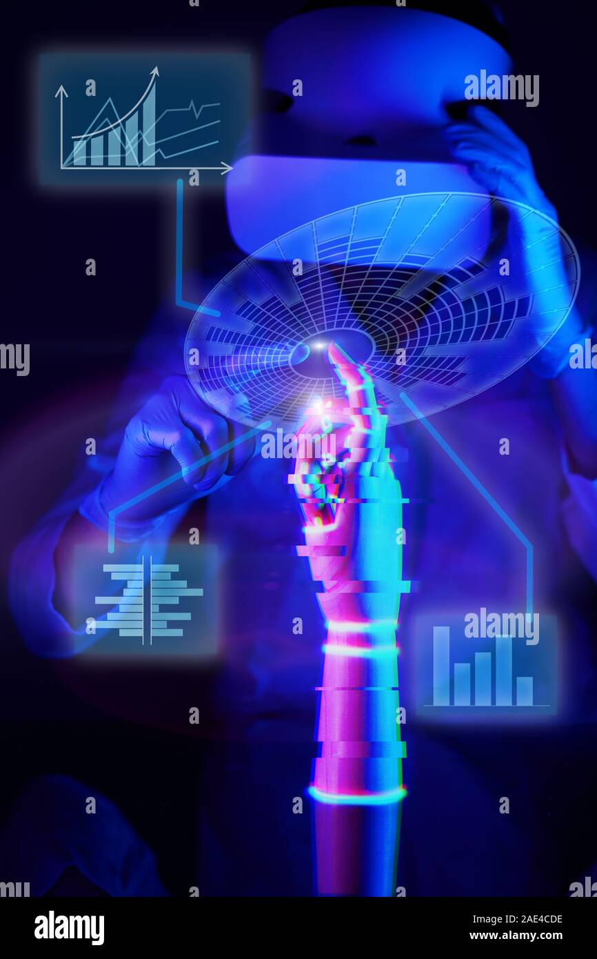 Engineer creates a robotic arm. Augmented Reality with graphics and ...