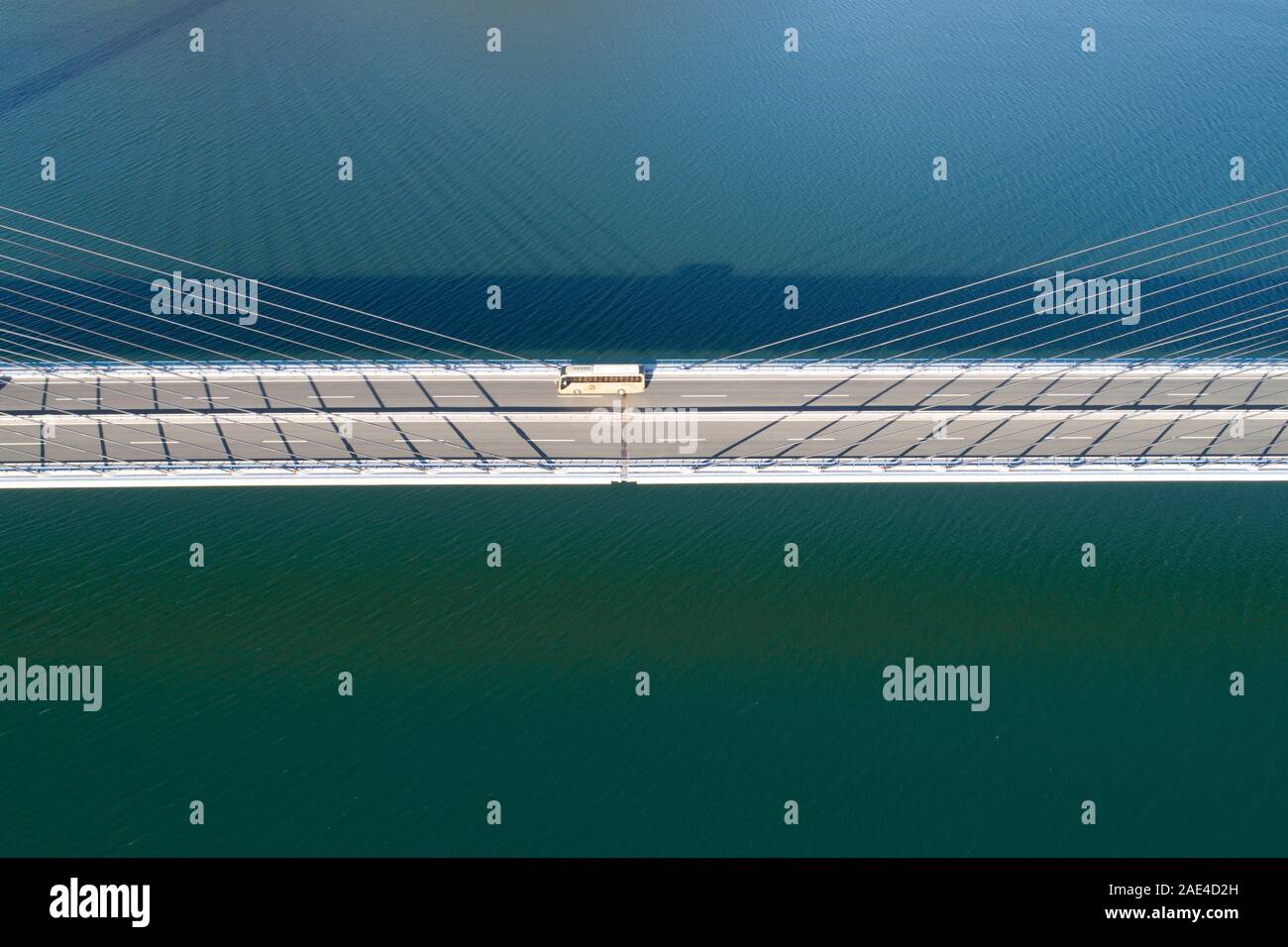 Bus crossing bridge in "Barrios De Luna" reservoir Stock Photo - Alamy