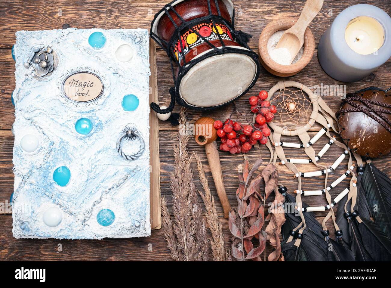 Witch doctor or shaman table flat lay background. Magic book on the ...