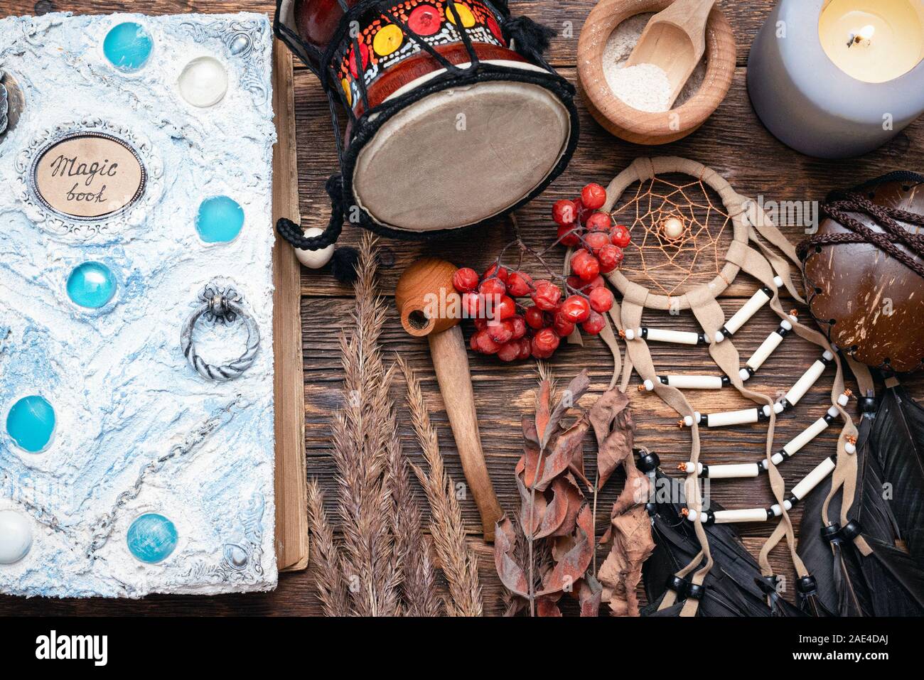 Witch doctor or shaman table flat lay background. Magic book on the ...
