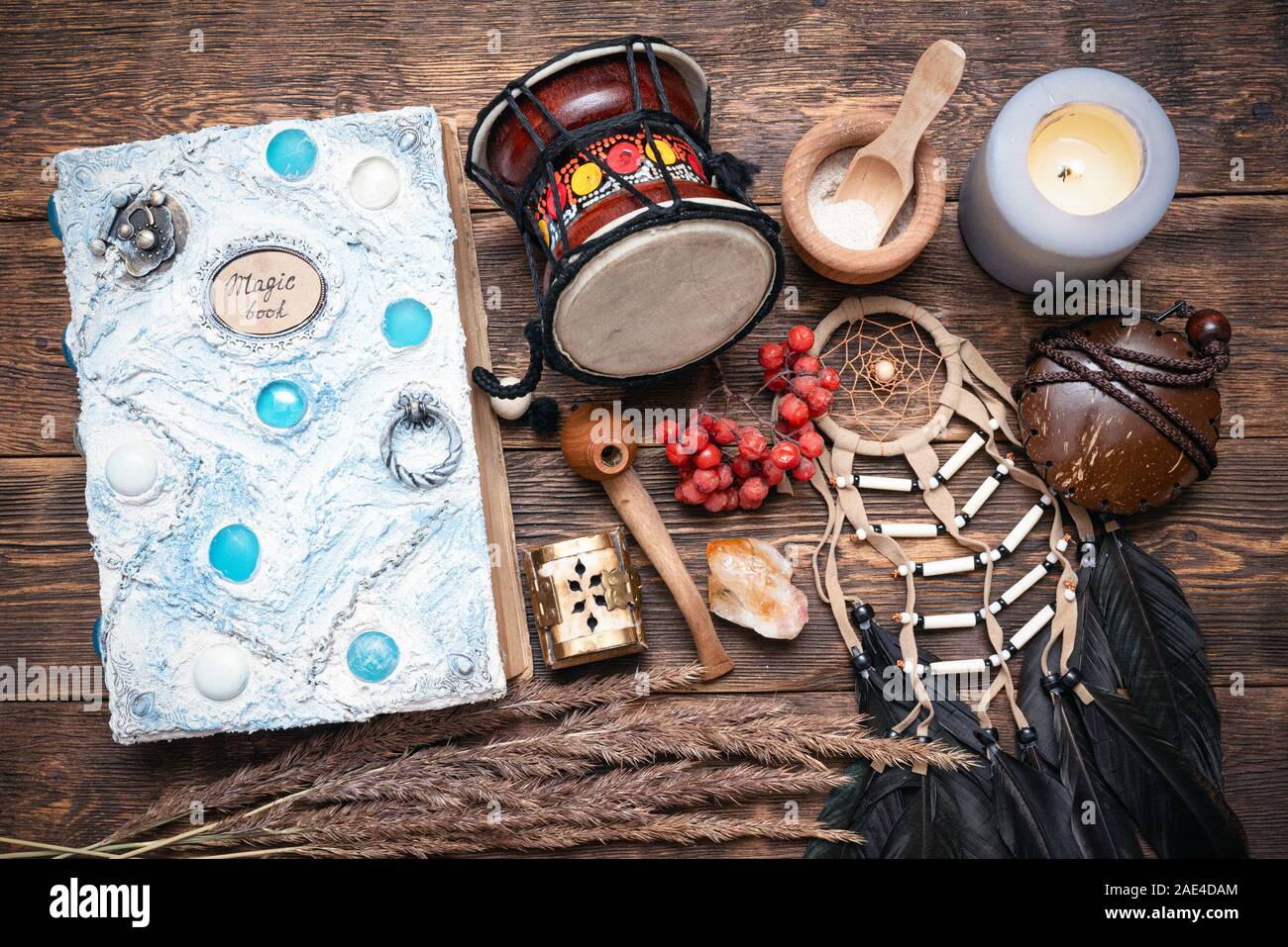 Witch doctor or shaman table flat lay background. Magic book on the ...