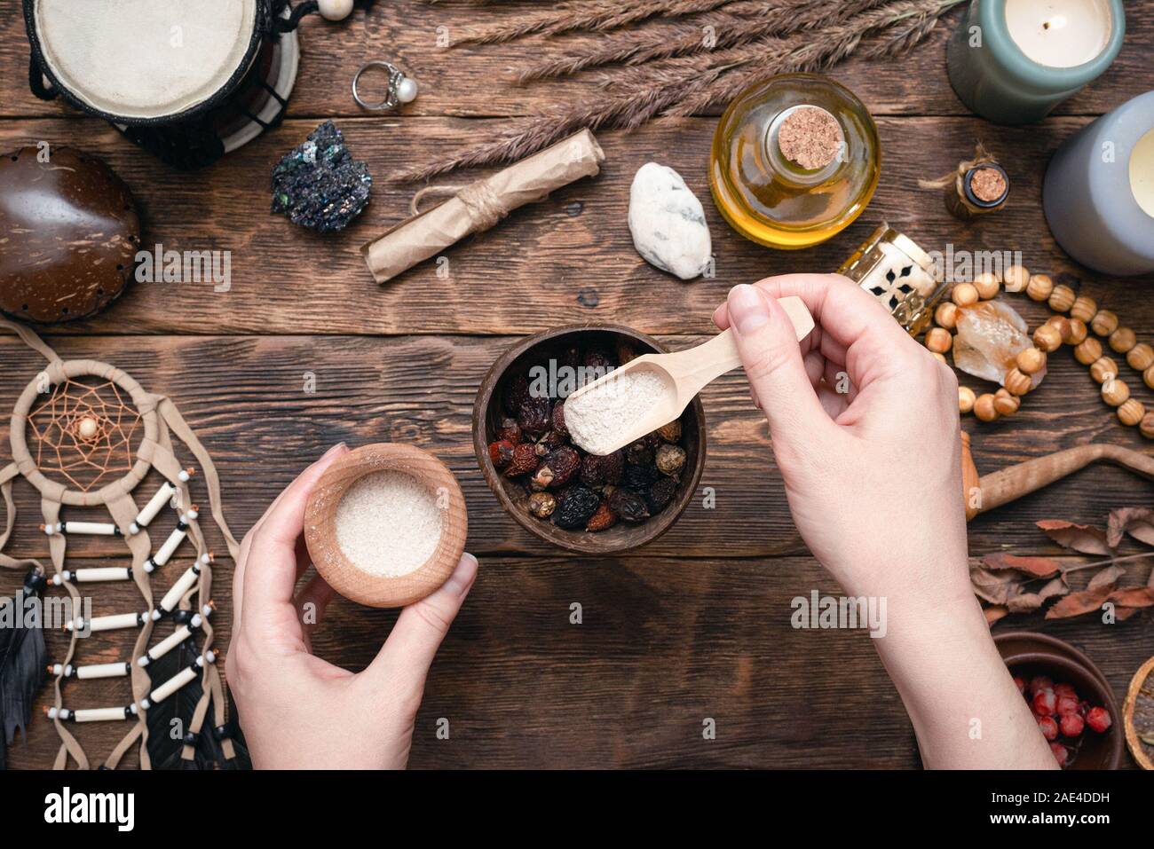 Witch doctor is preparing a magic potion on her table Stock Photo - Alamy
