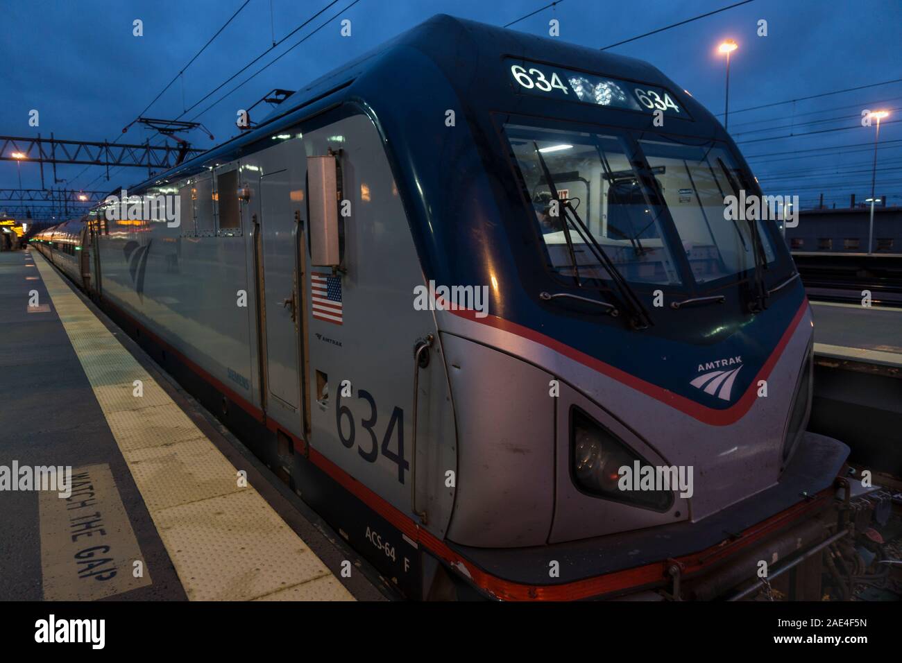 Engineer in engine of Amtrak Northeast regional train awaits departure ...