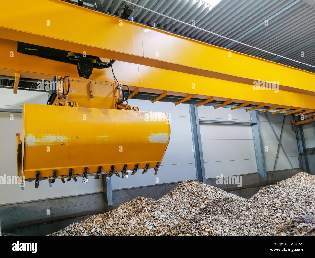 Biomass crane for handling Waste, Slag, Sludge, Straw bale Stock Photo ...