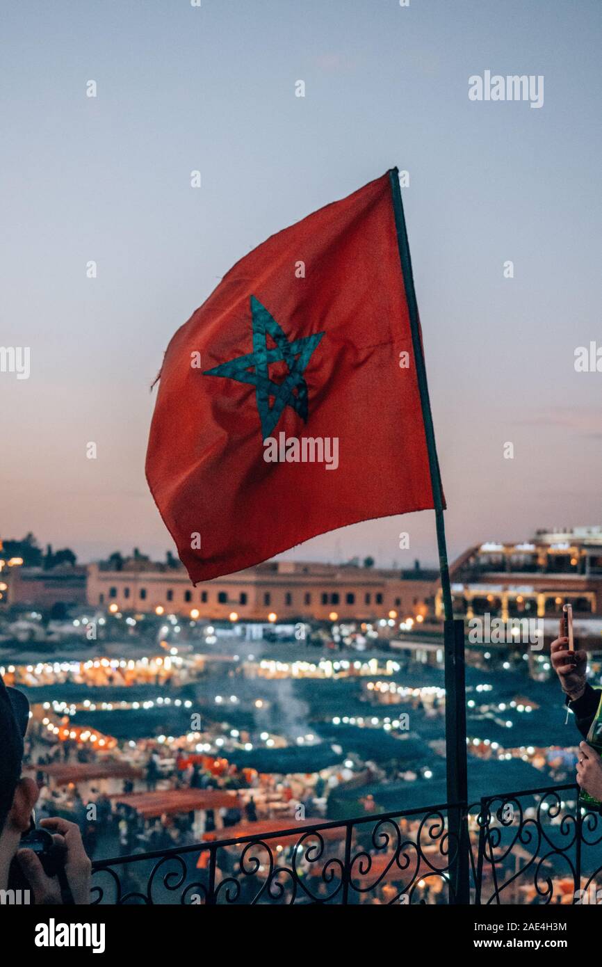 Beautiful red Flag of Morocco Stock Photo - Alamy