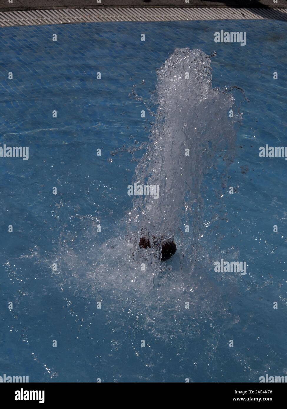 Water spouting in Fountain in Spanish Village Stock Photo - Alamy