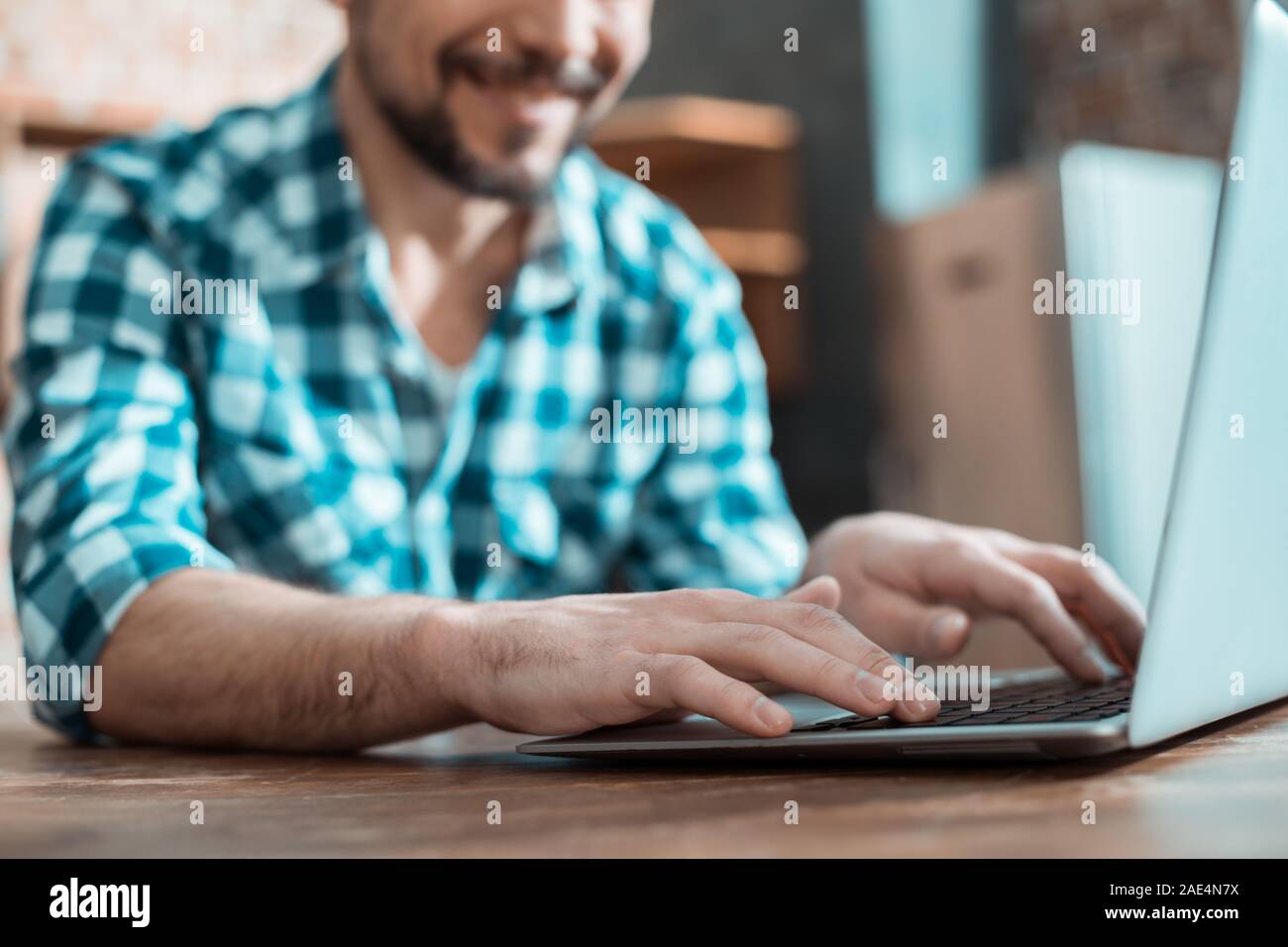 Nice smart man typing Stock Photo - Alamy