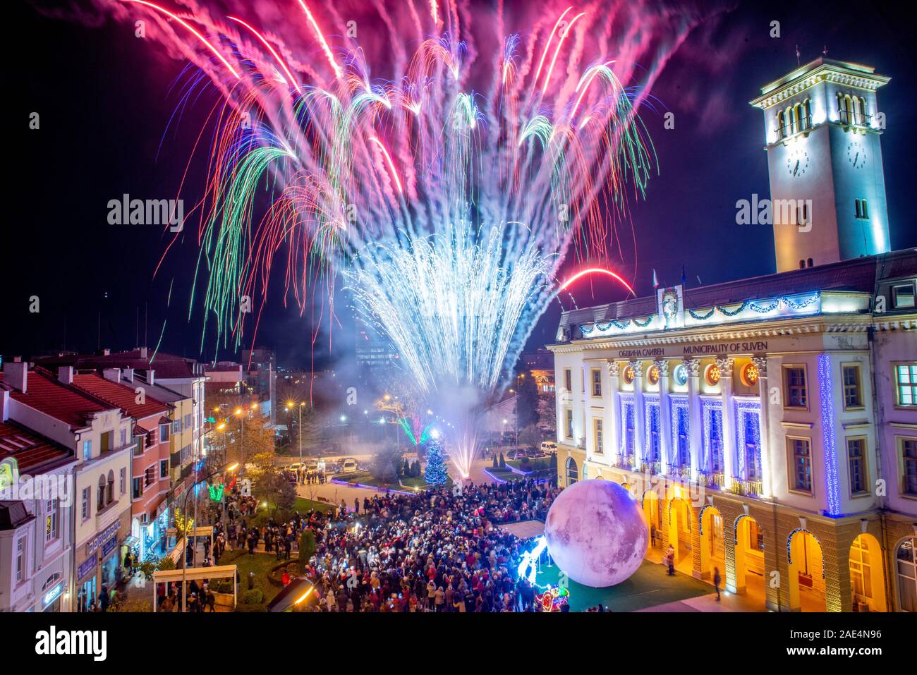 Magnificent fireworks during a street celebration on a square in a town ...