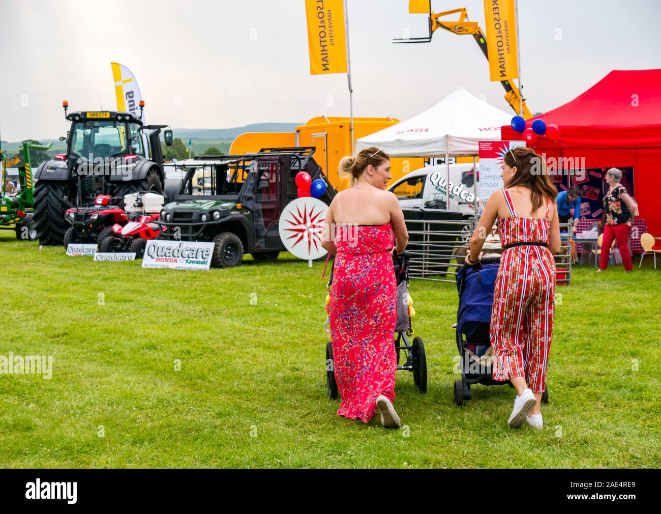 Mothers in Summer outfits pushing baby buggies, Haddington Agricultural ...