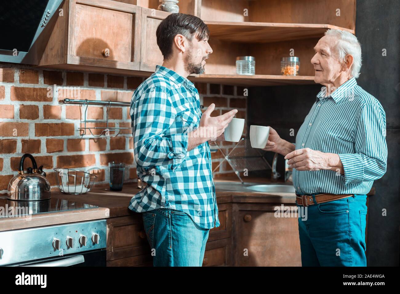 Father talking with baby hi-res stock photography and images - Alamy