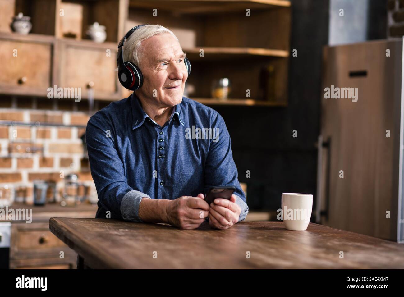 Cheerful old man enjoying music hi-res stock photography and images - Alamy