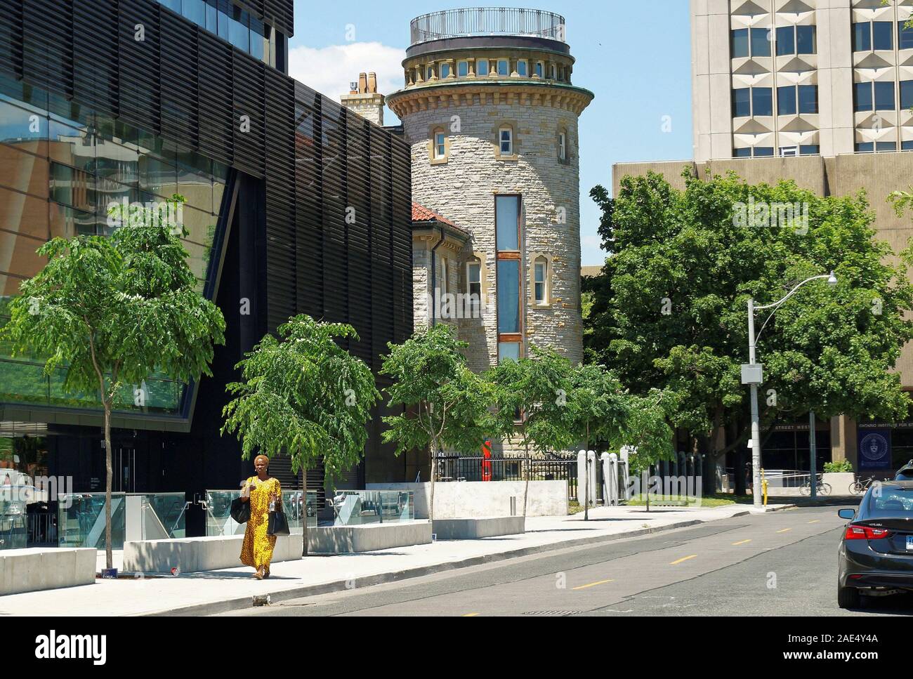 TORONTO, CANADA -06 17 2016: A woman walking along the Devonshire Pl in ...