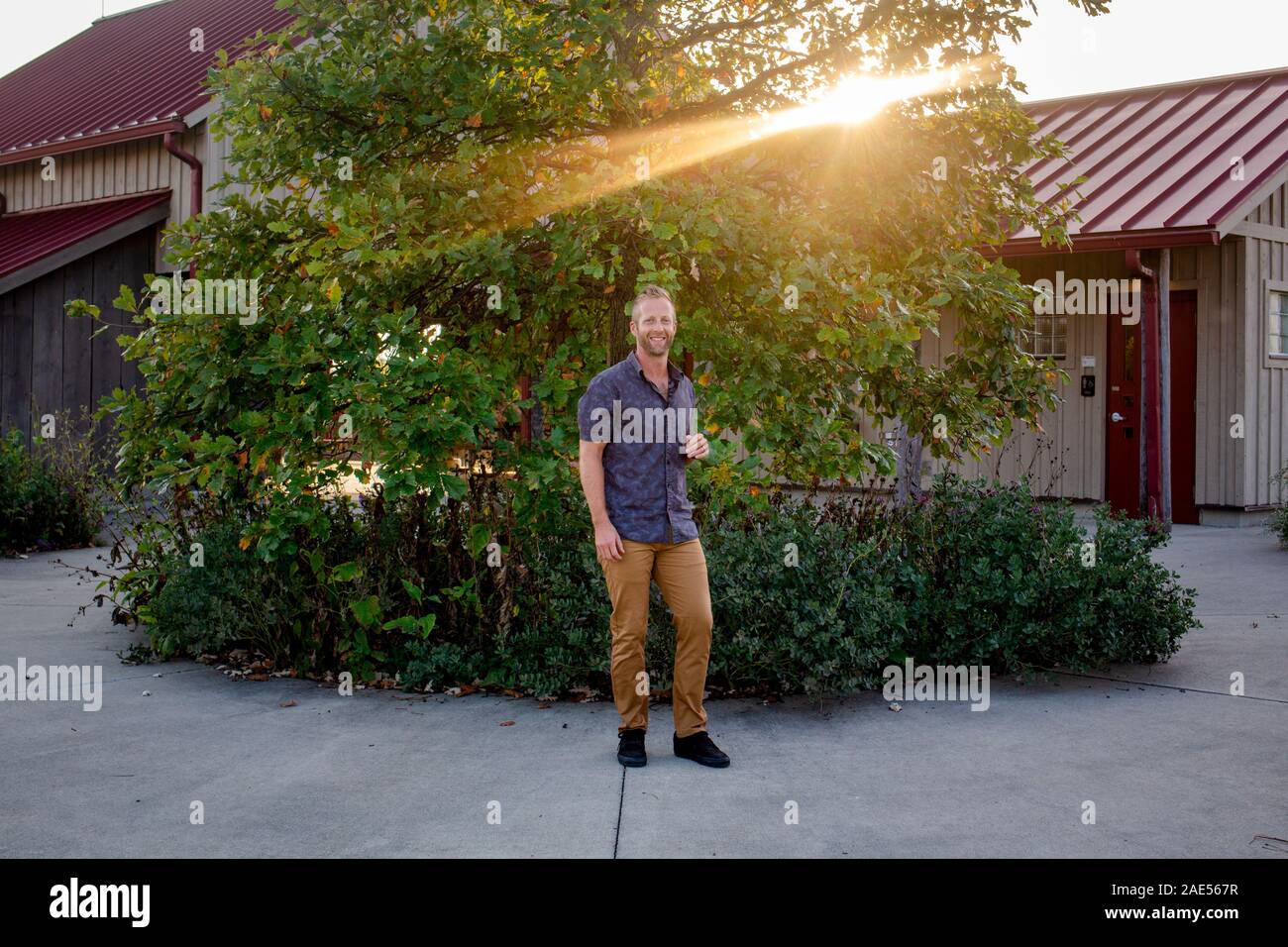 Man standing outside a house hi-res stock photography and images - Alamy