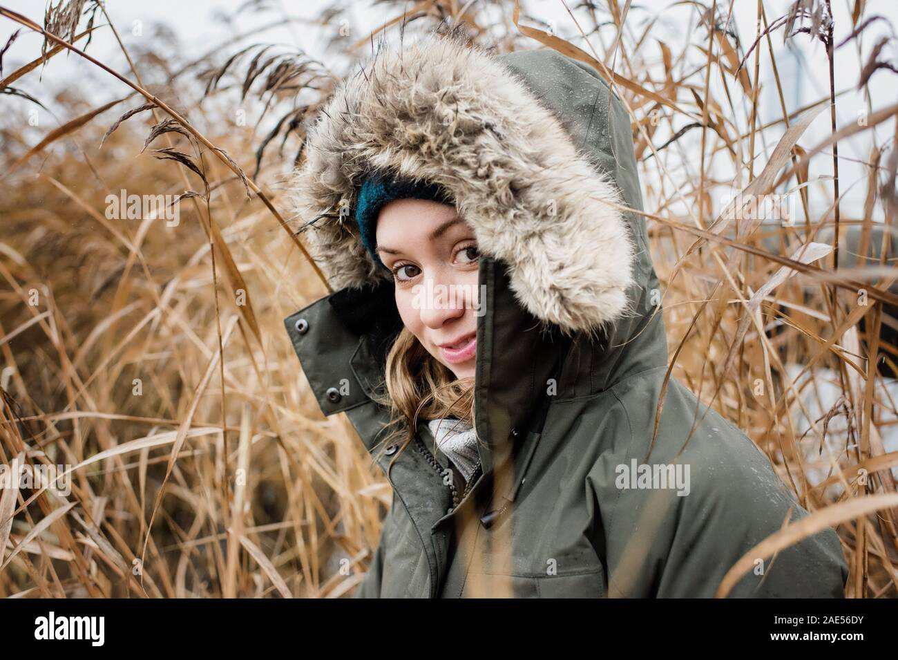 portrait woman of looking smiling looking interested Stock Photo - Alamy