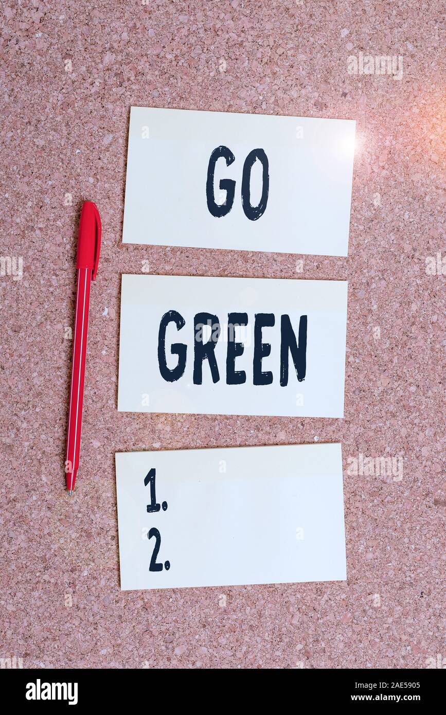 Conceptual hand writing showing Go Green. Concept meaning making more ...