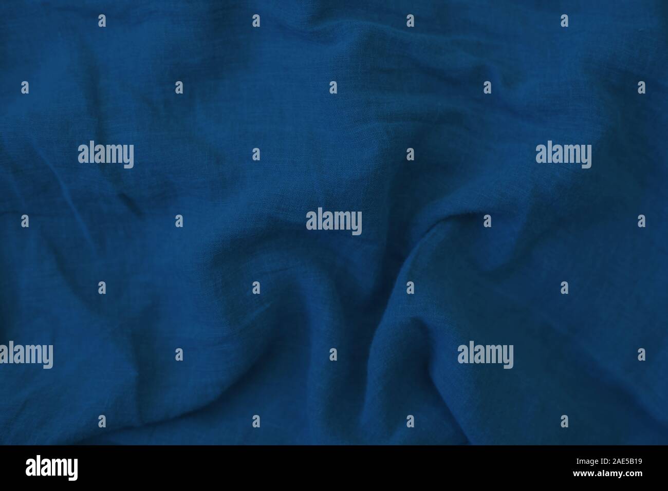 Crumpled blue fabric texture close up. Trendy tone of 2020 classic blue ...
