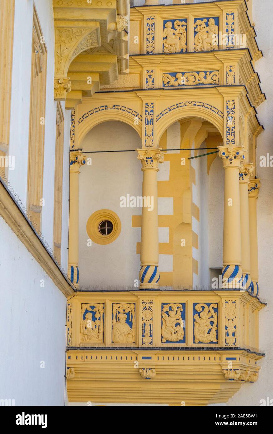 Decorative stone carvings of architrave column of balcony overlooking ...