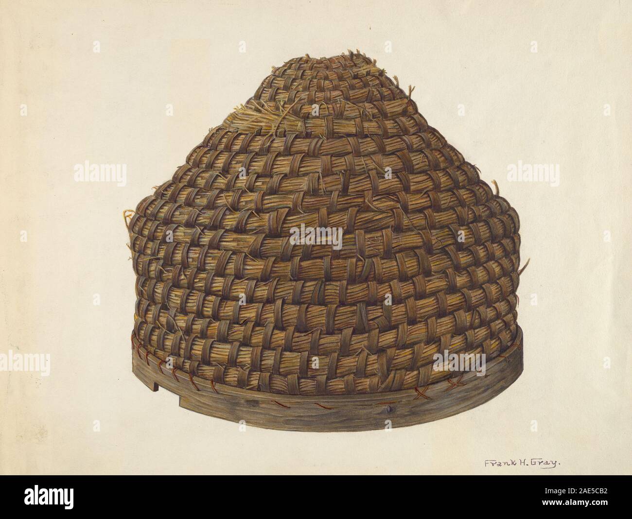 A straw bee hive made by Frank Gray around 1940, constructed from woven ...
