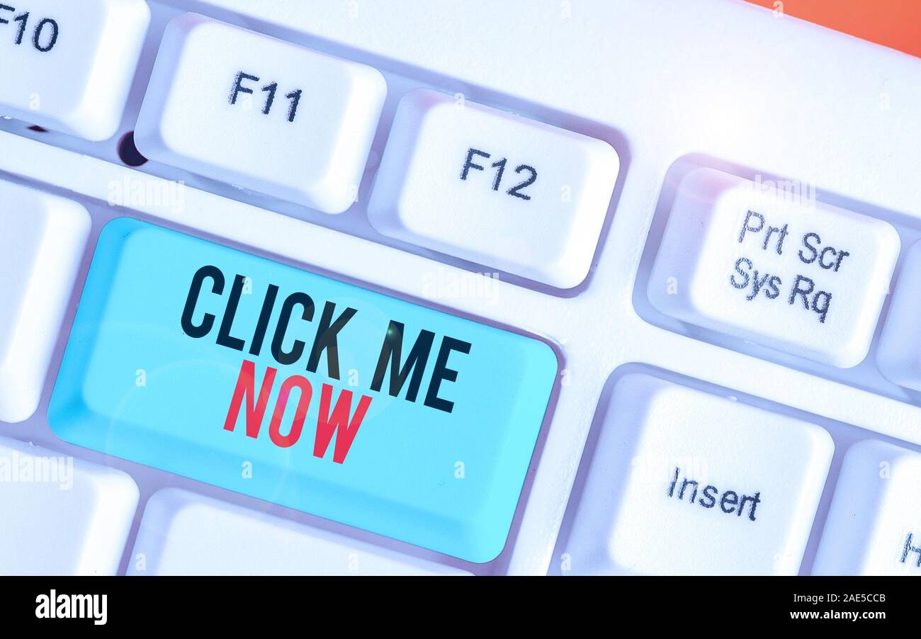 Writing note showing Click Me Now. Business concept for Internet ...