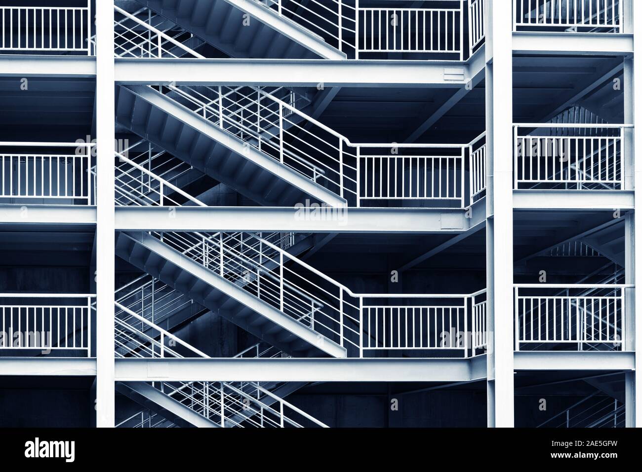 Modern interior abstract fragment with steel railings and stairs made ...