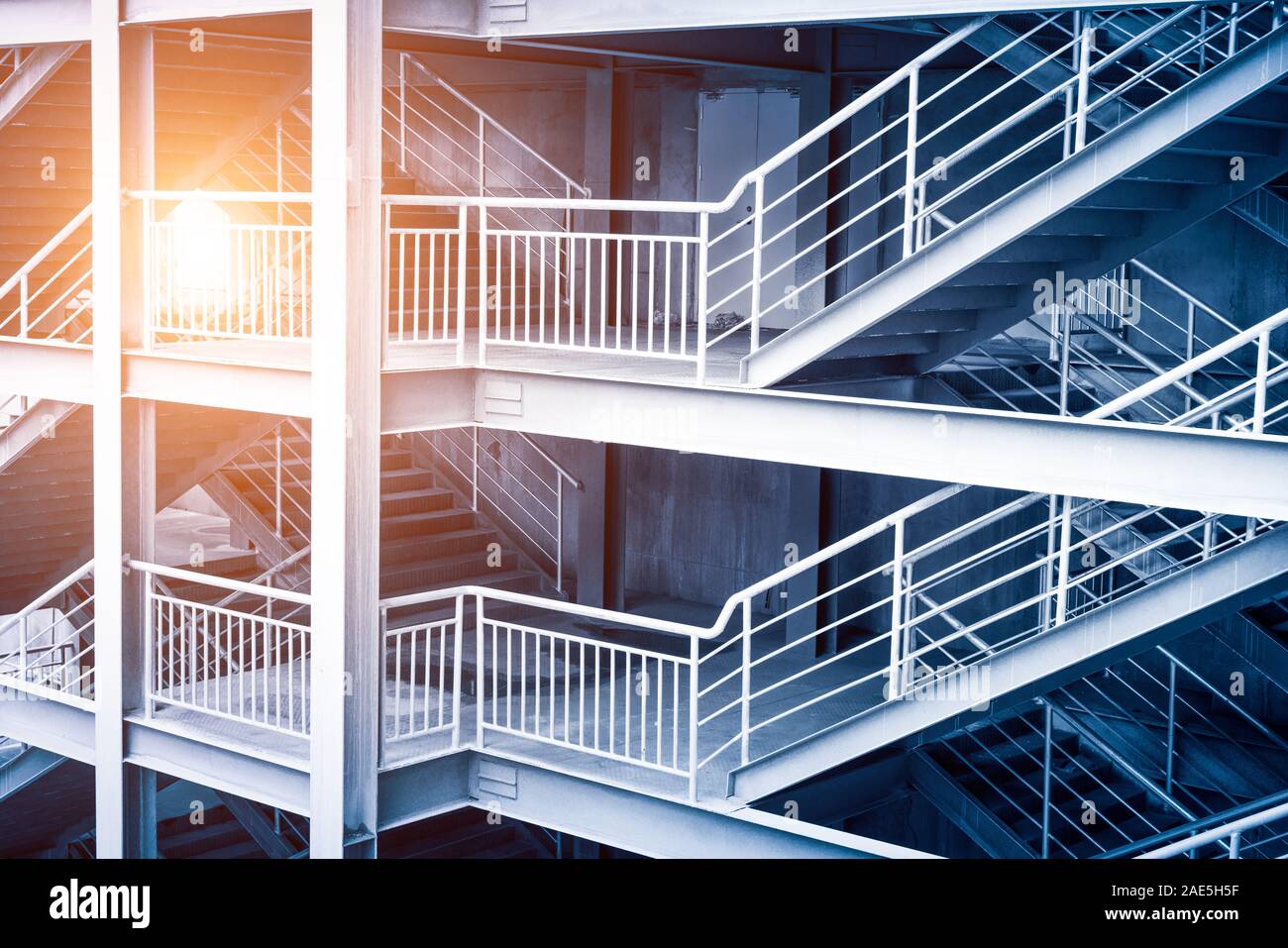 Modern interior abstract fragment with steel railings and stairs made ...