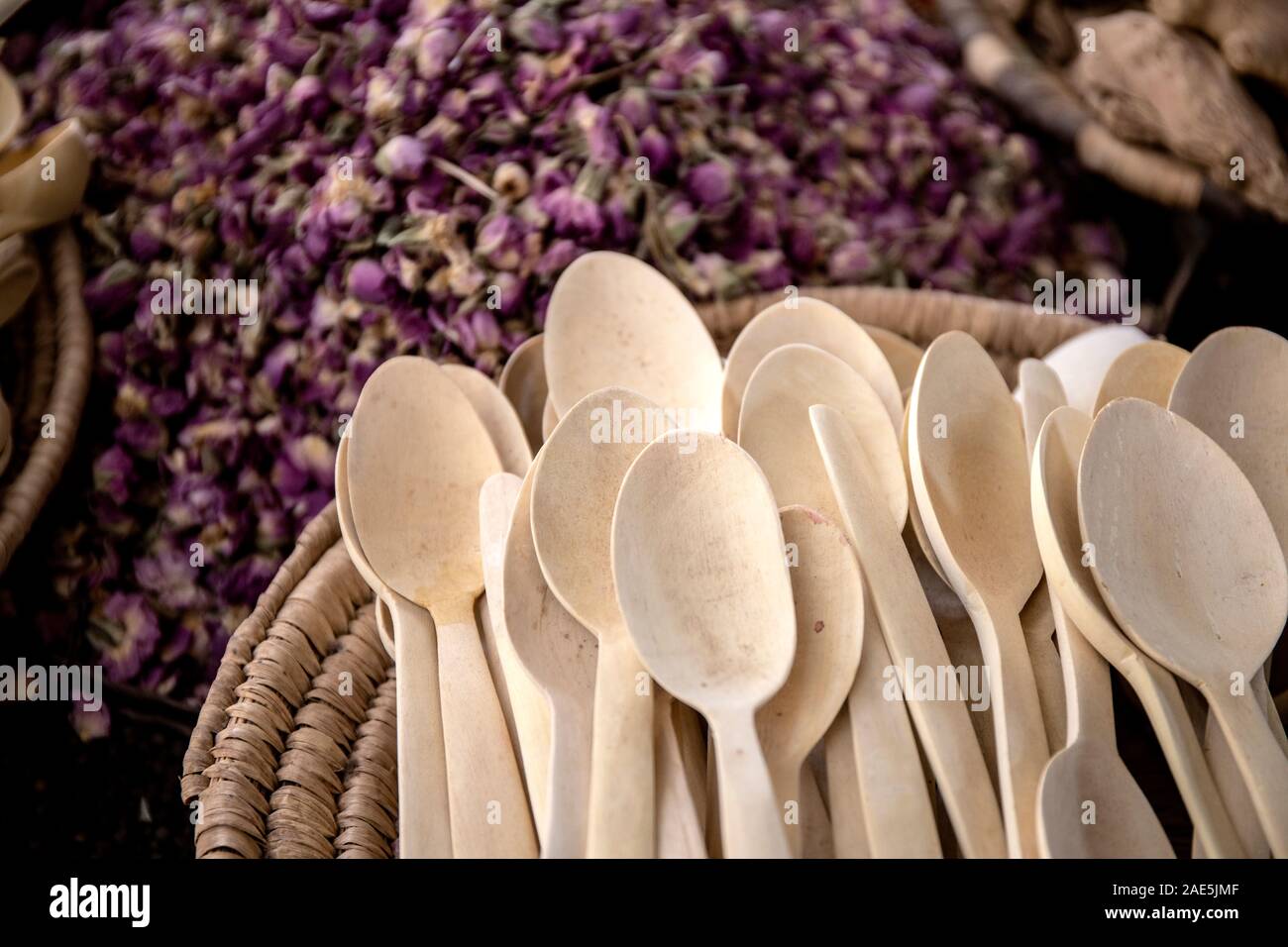 handmade wooden spoons and potpourri being sold at a street market in ...
