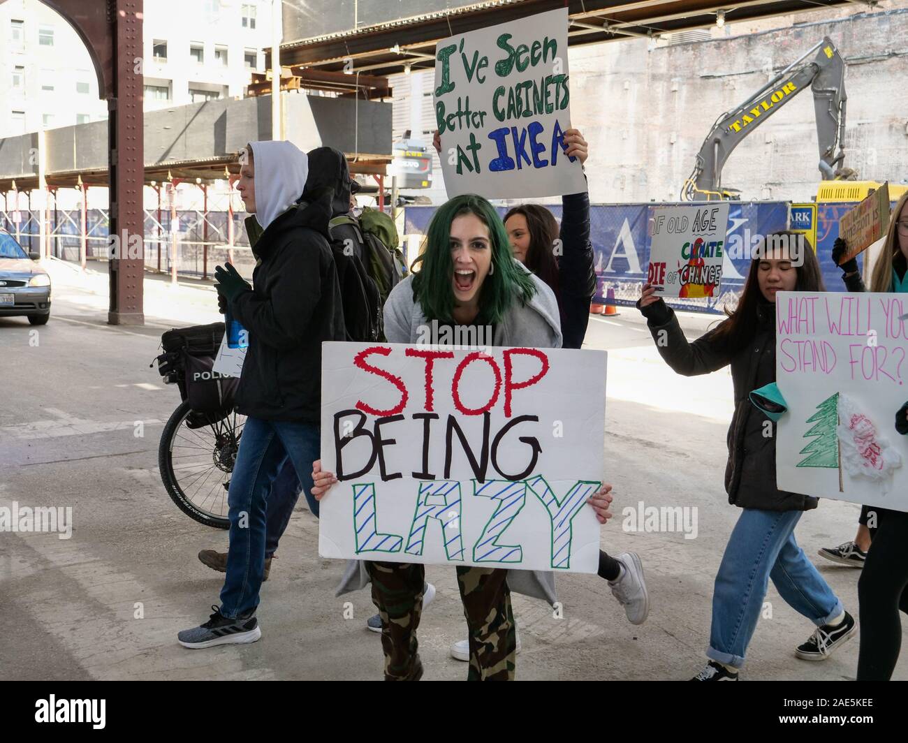 Chicago, Illinois, USA. 6th December 2019. A young student protestor ...