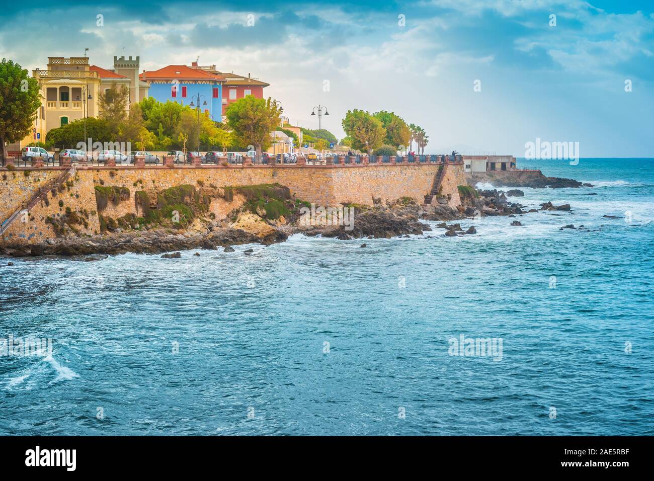 Alghero, Sardinia. Summer sunset view of the Alghero old town quarter ...