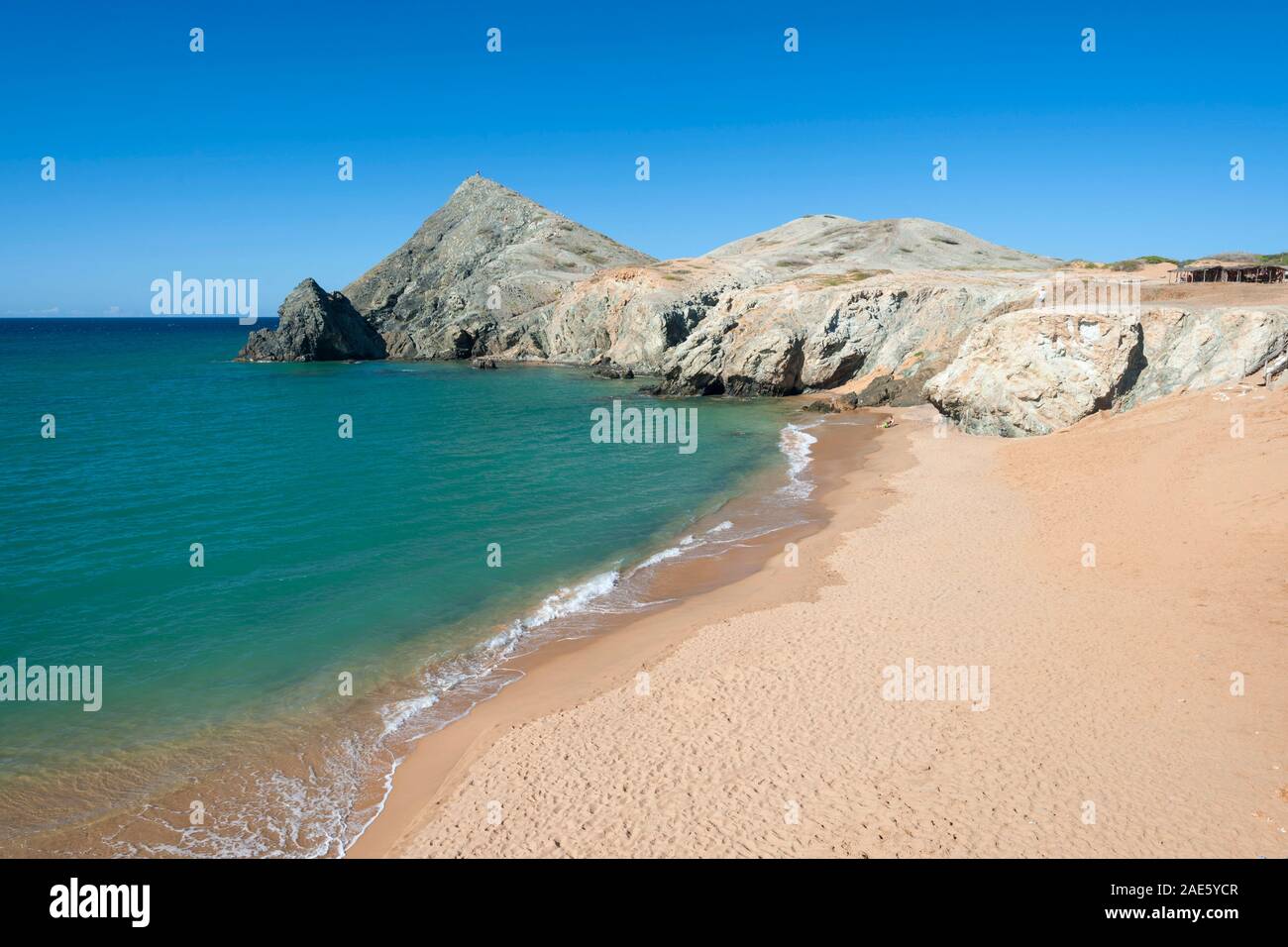 Tourists walking up the Hill of the Pillar of Sugar (Cerro El Pilón de ...