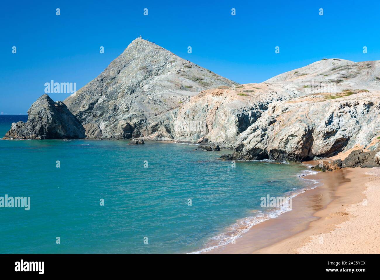 Tourists walking up the Hill of the Pillar of Sugar (Cerro El Pilón de ...