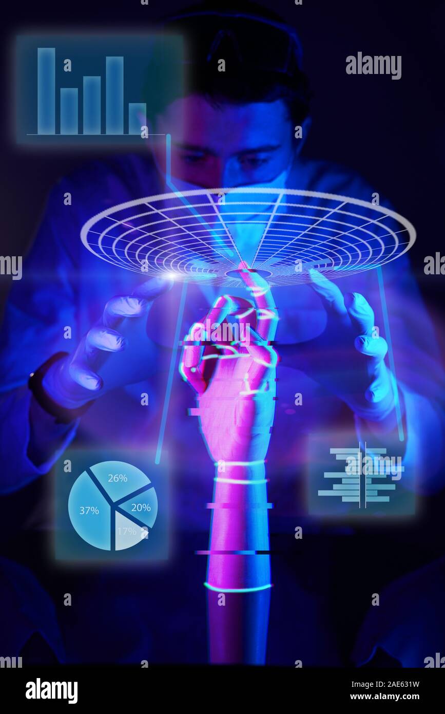 Engineer creates a robotic arm. Augmented Reality with graphics and ...