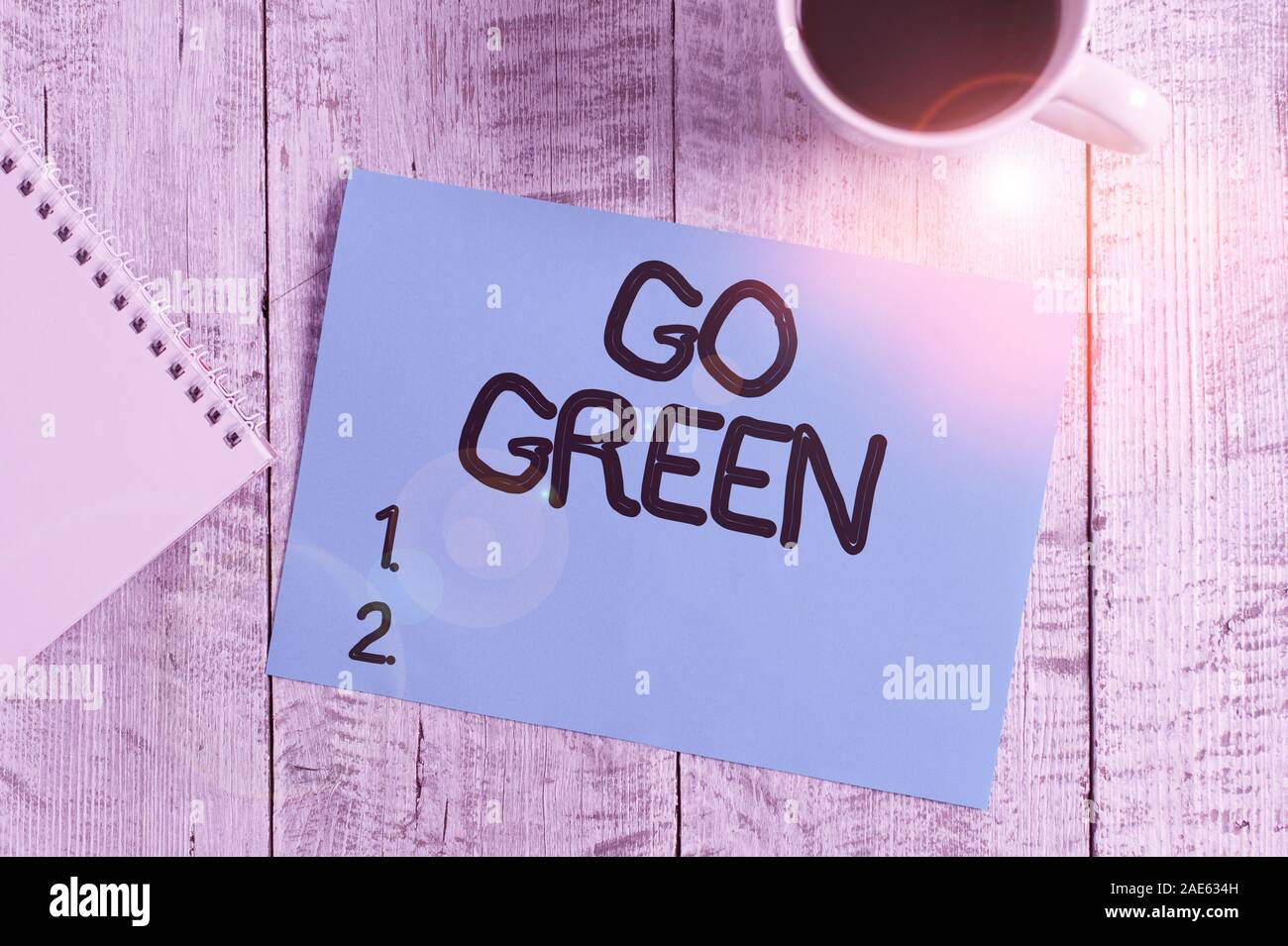 Handwriting text writing Go Green. Conceptual photo making more ...