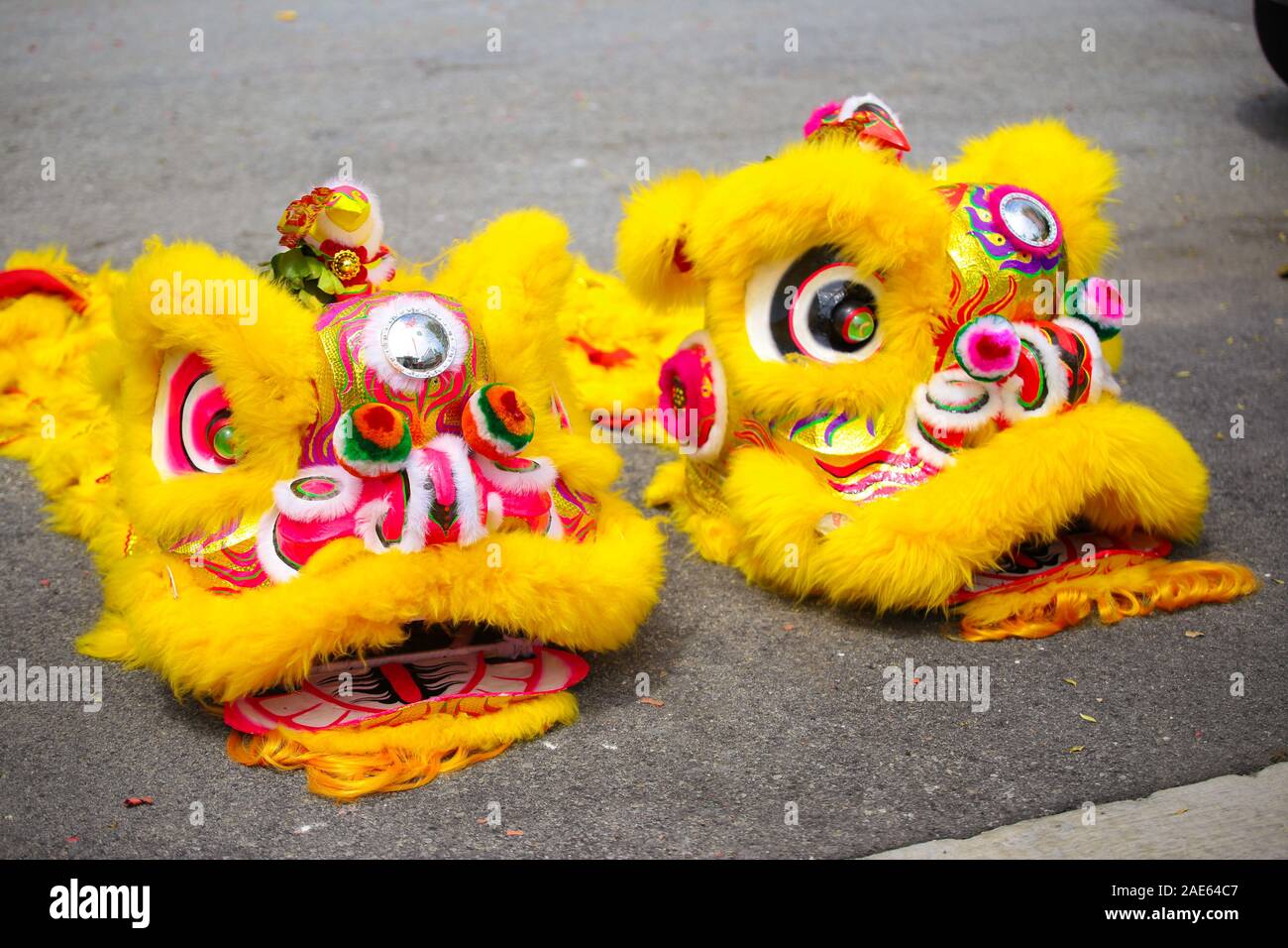 Lion dance heads Stock Photo - Alamy