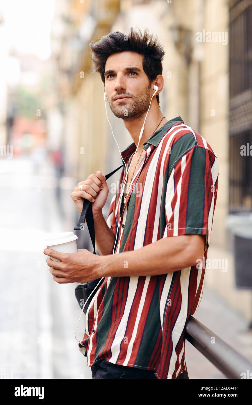 Young male traveler enjoying the streets of Granada, Spain Stock Photo ...