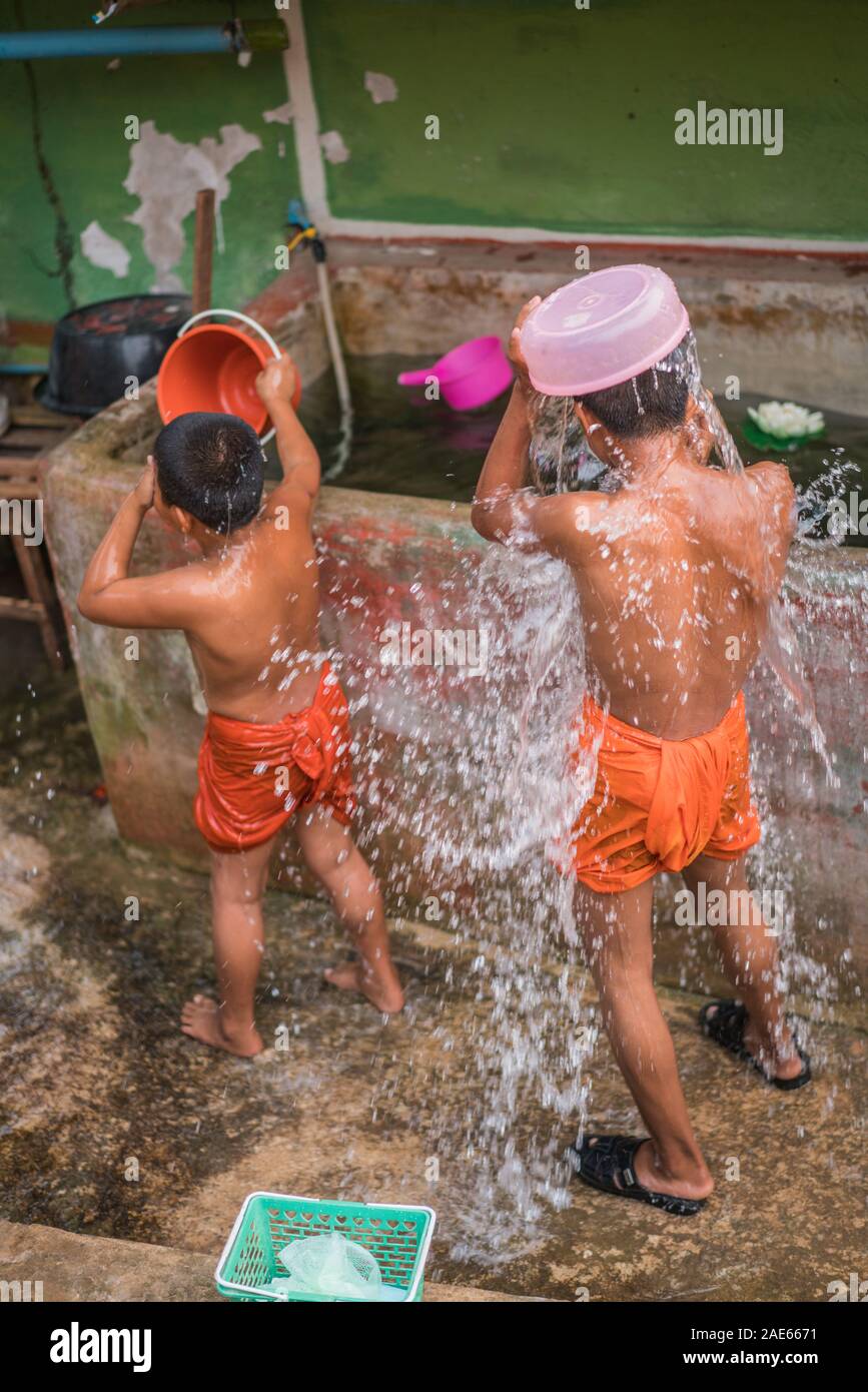 Monk have bath in the temple, Pakbeng, Laos, Asia Stock Photo - Alamy
