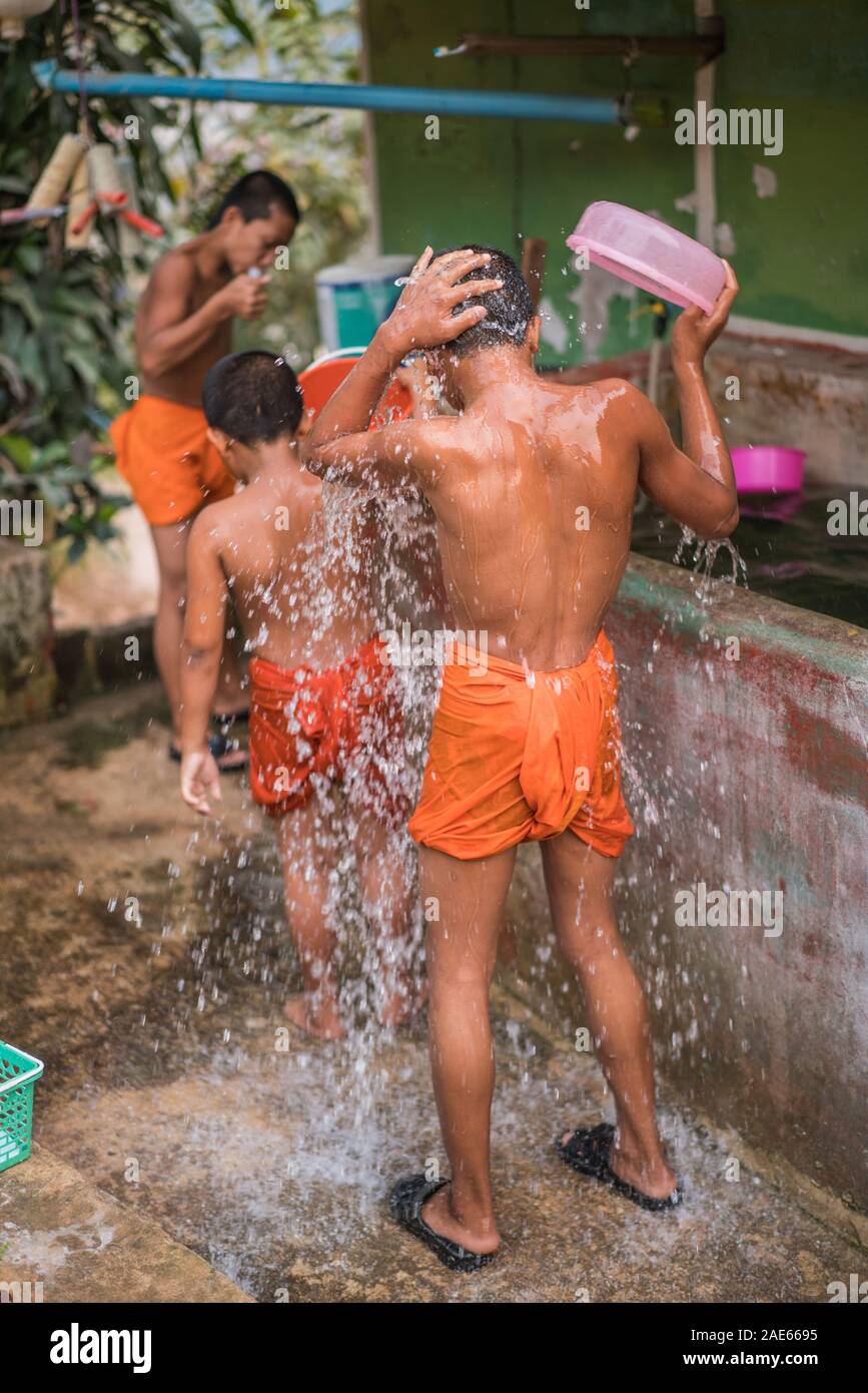Monk have bath in the temple, Pakbeng, Laos, Asia Stock Photo - Alamy