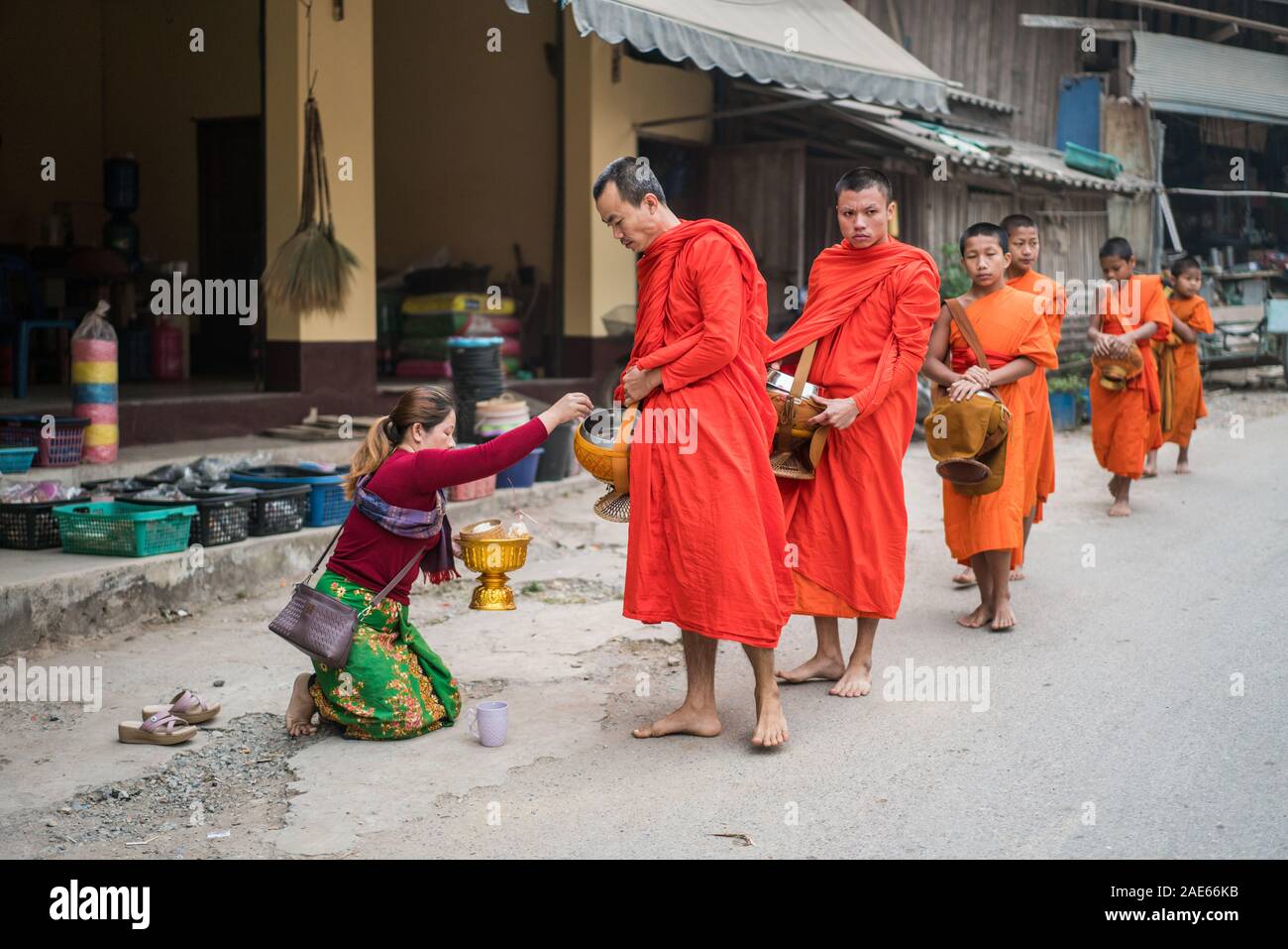Monks procession in Pak Beng, Laos, Asia Stock Photo - Alamy