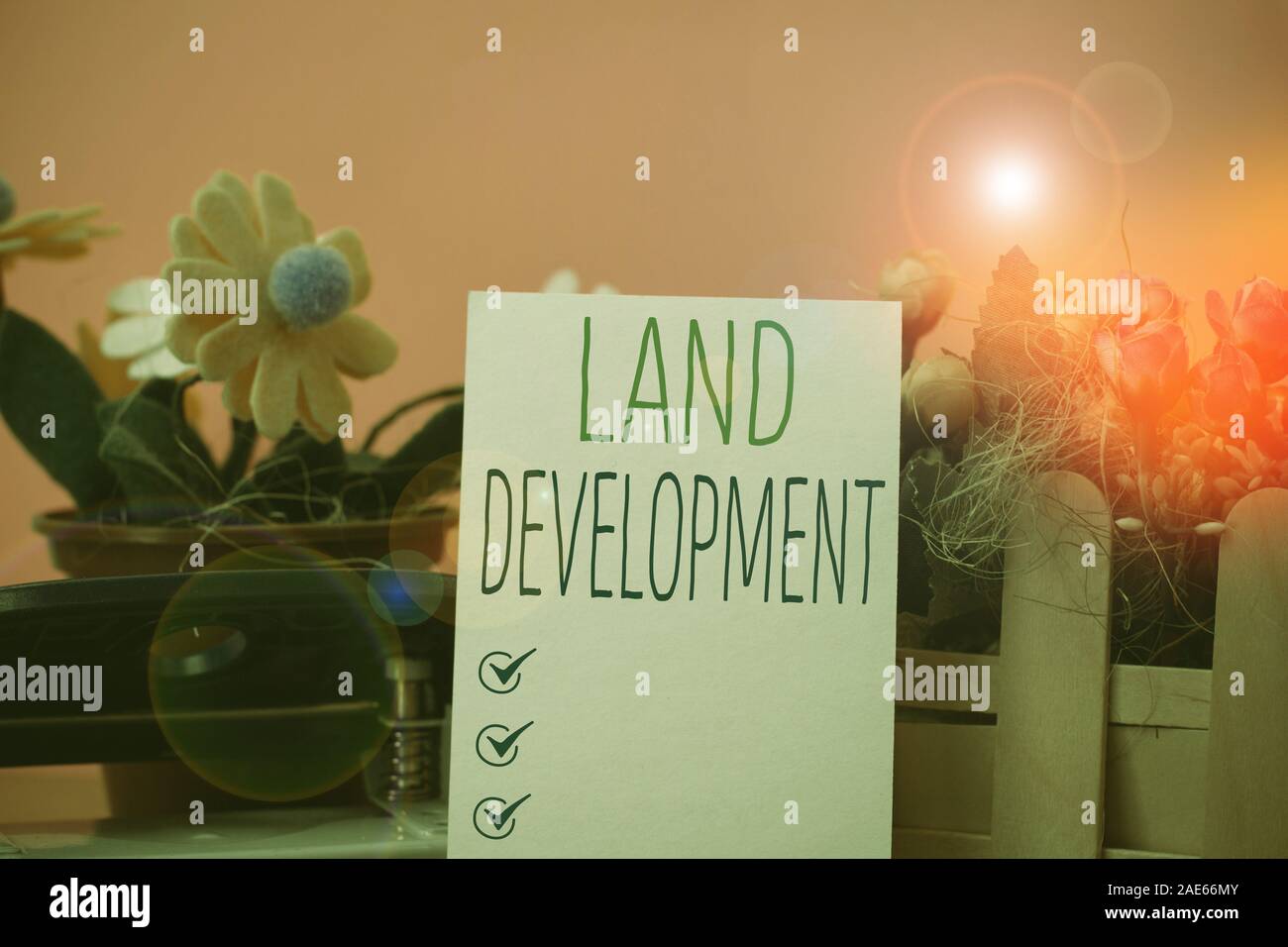 Writing note showing Land Development. Business concept for process of ...